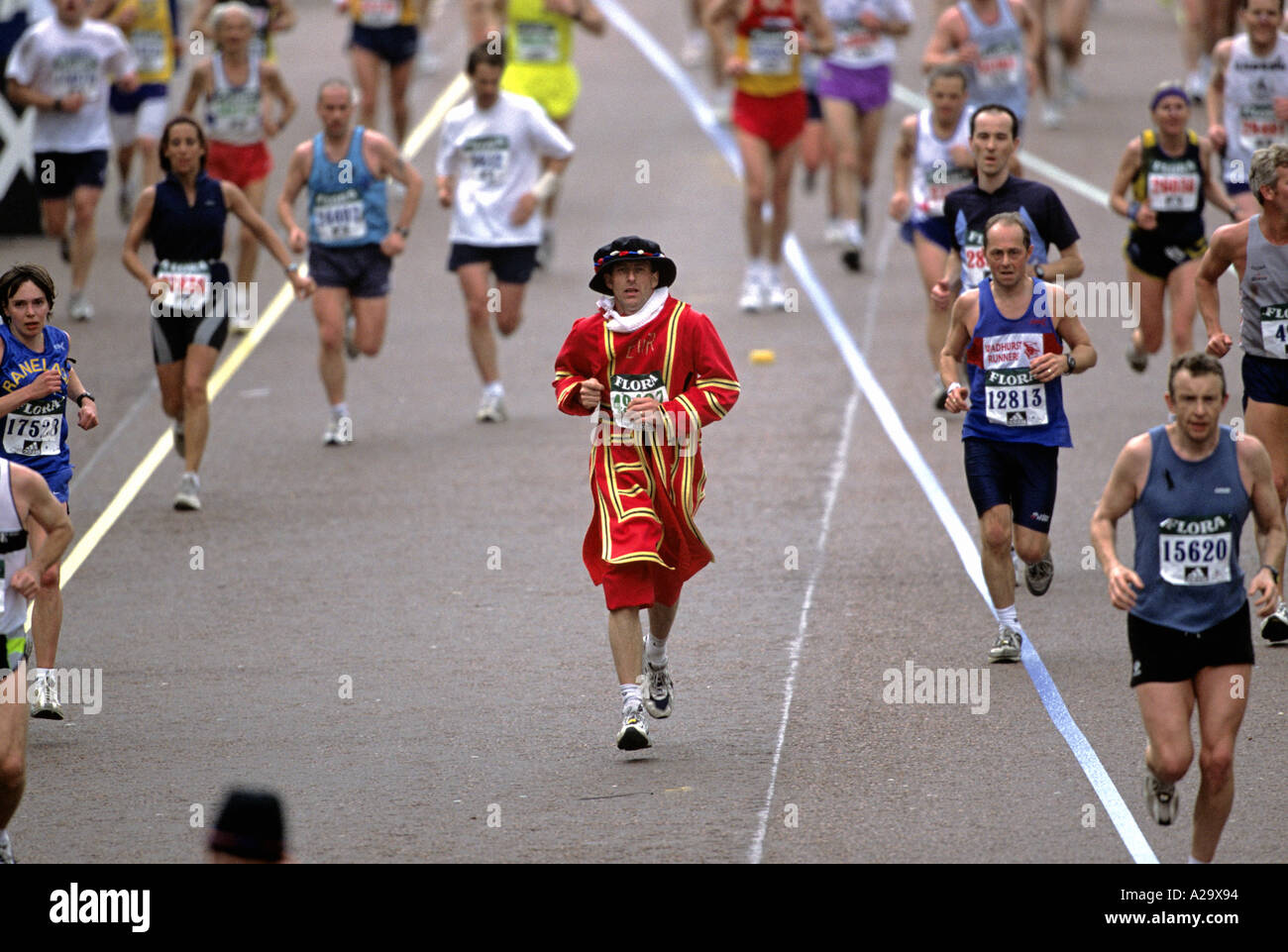 A fun runner dressed as a Beefeater running in the London Marathon ...