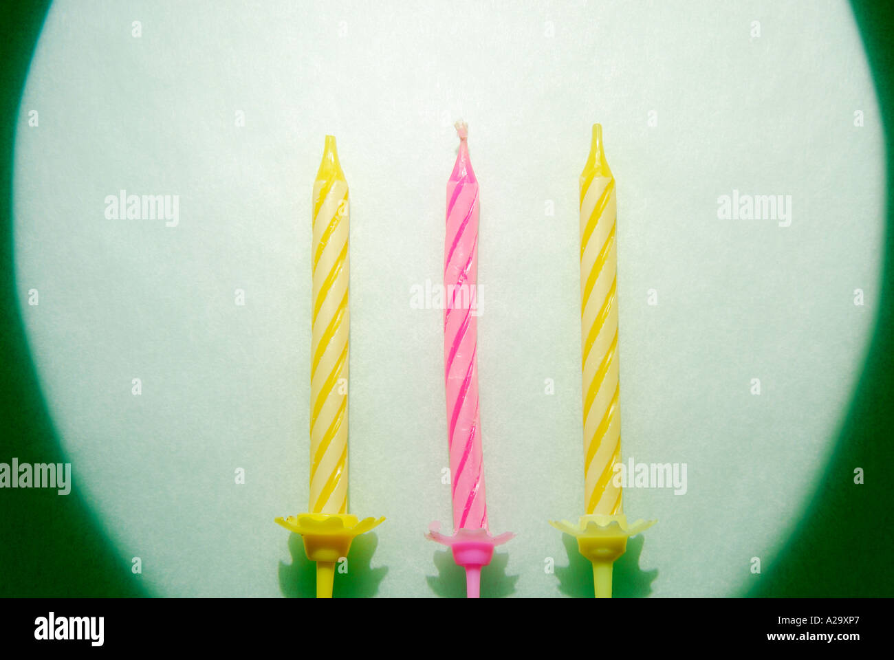 Three candles on candlestick Stock Photo - Alamy