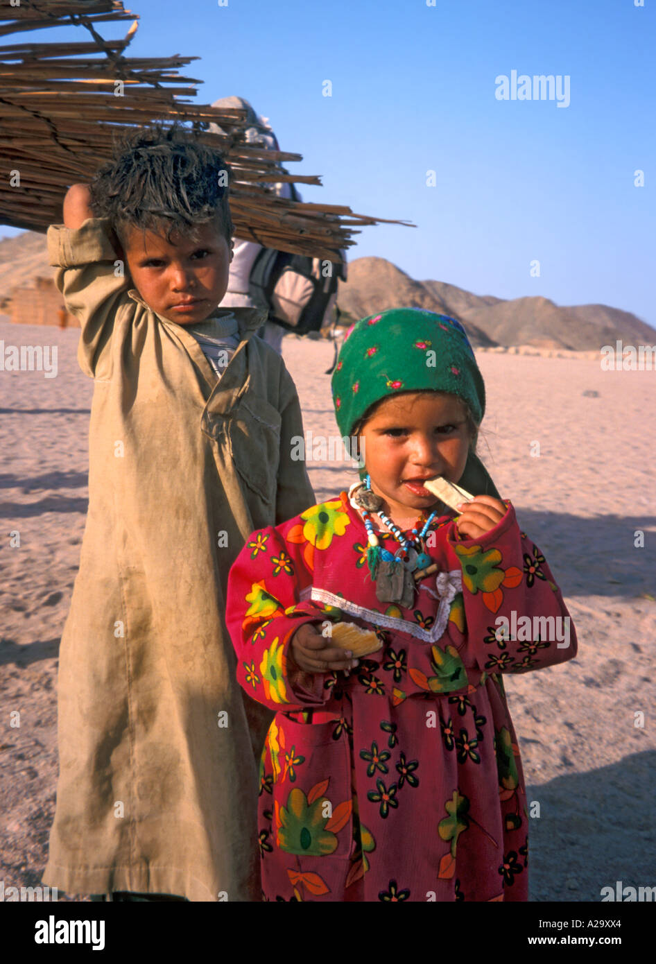 Poor children eating Stock Photo - Alamy