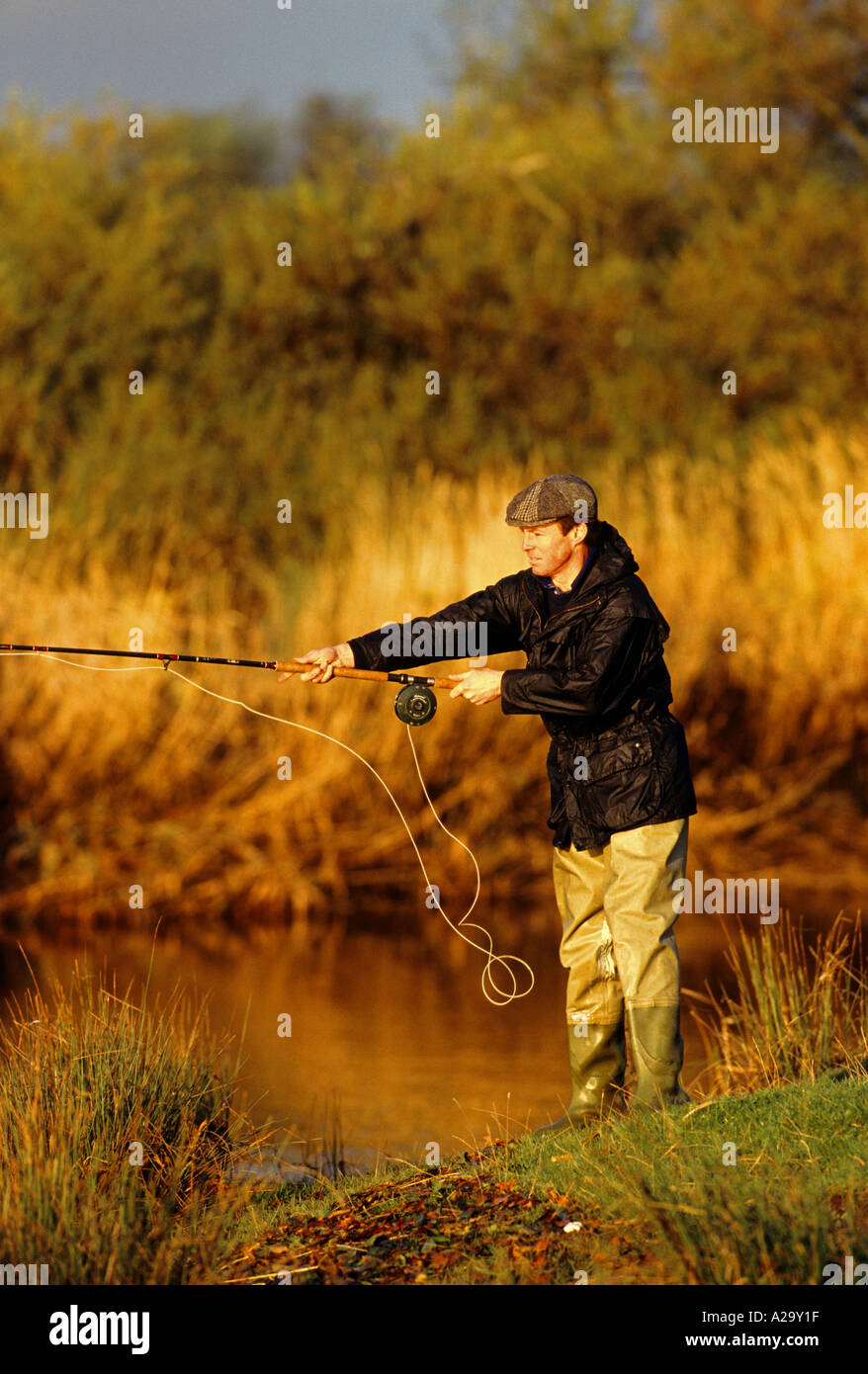 Man wearing waders hi-res stock photography and images - Alamy