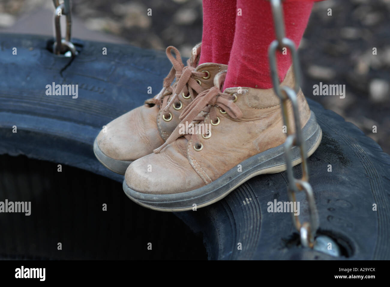 two shoes on a swingswang Stock Photo - Alamy