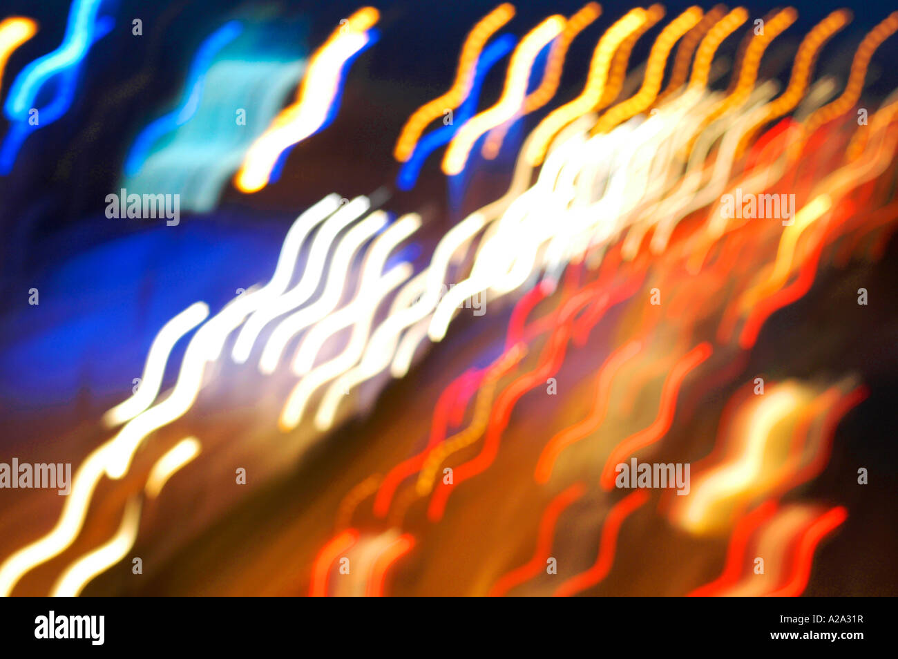 traffic at city highway at evening, light effects Stock Photo - Alamy