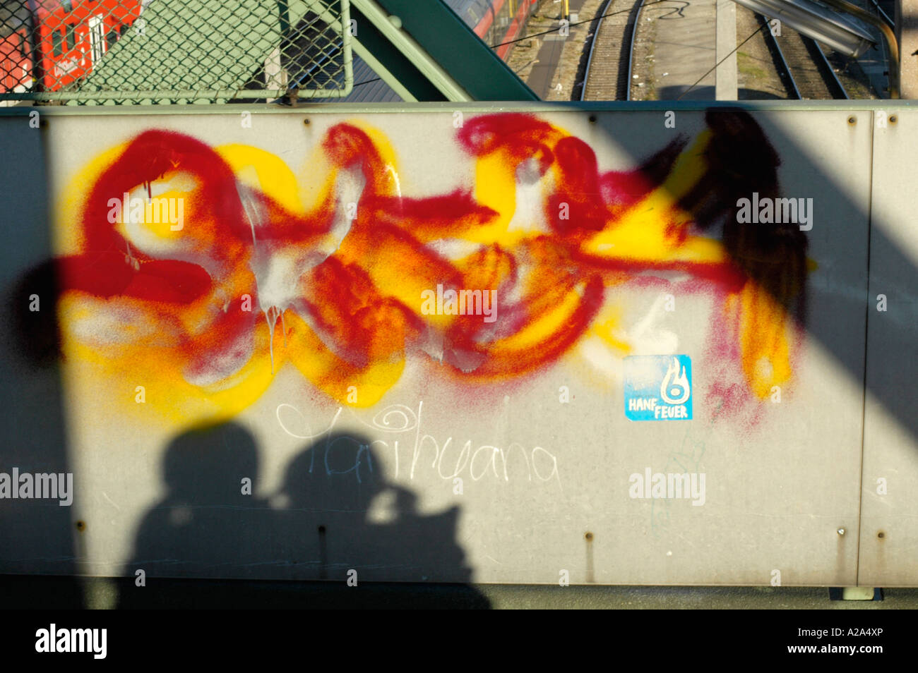 shadow in front of a grafitti wall Stock Photo - Alamy
