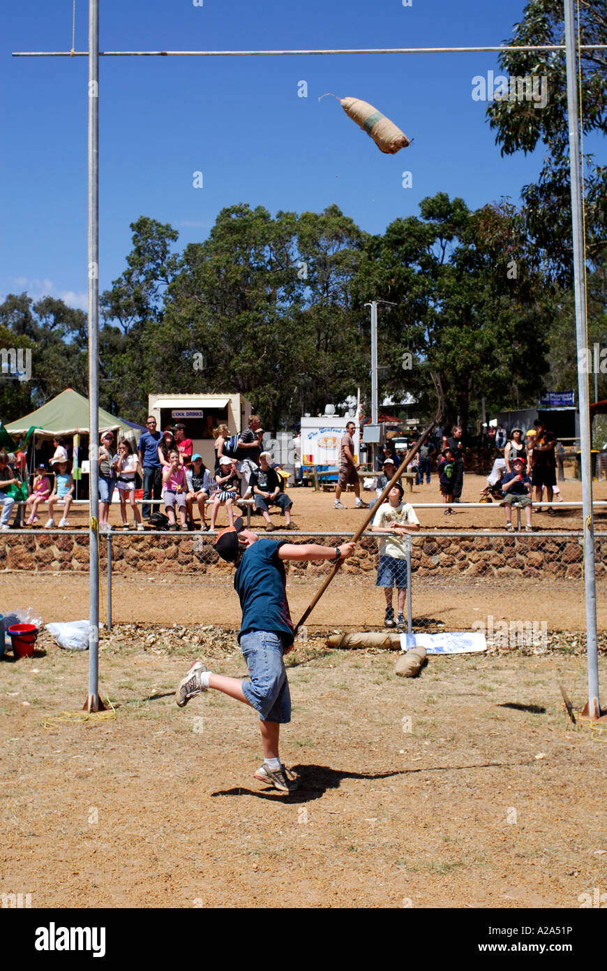young man tossing the sheaf Stock Photo - Alamy
