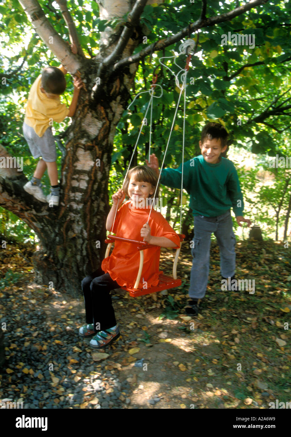 girl on seesaw Stock Photo - Alamy