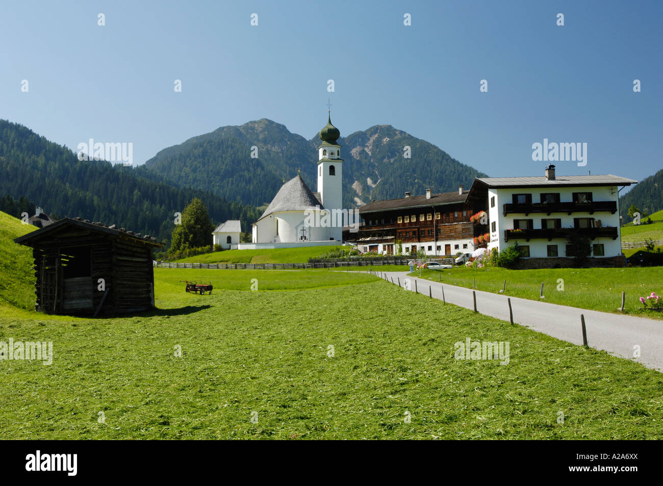 village with a church Stock Photo - Alamy