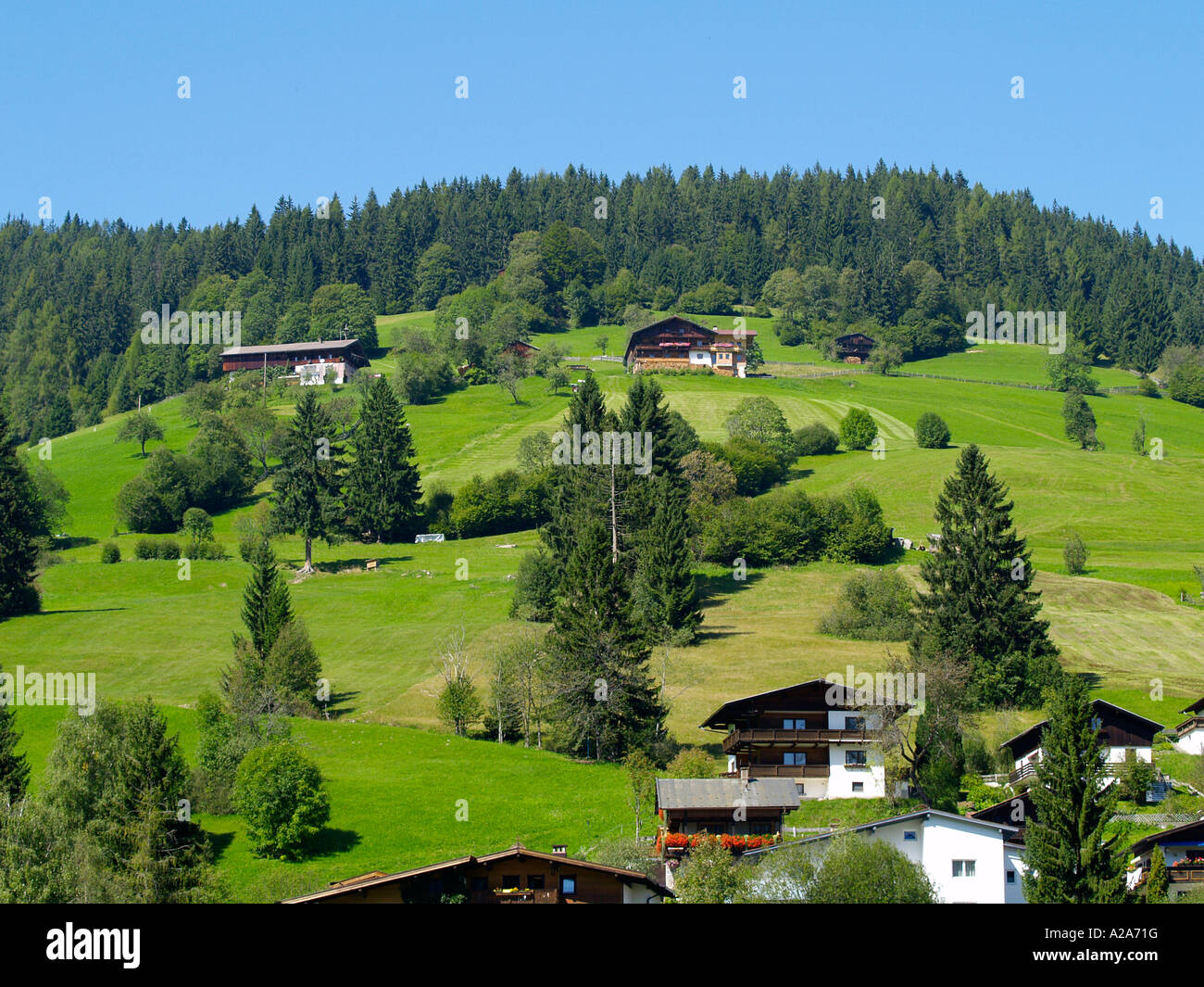 village in the countryside with a hilly landscape Stock Photo - Alamy