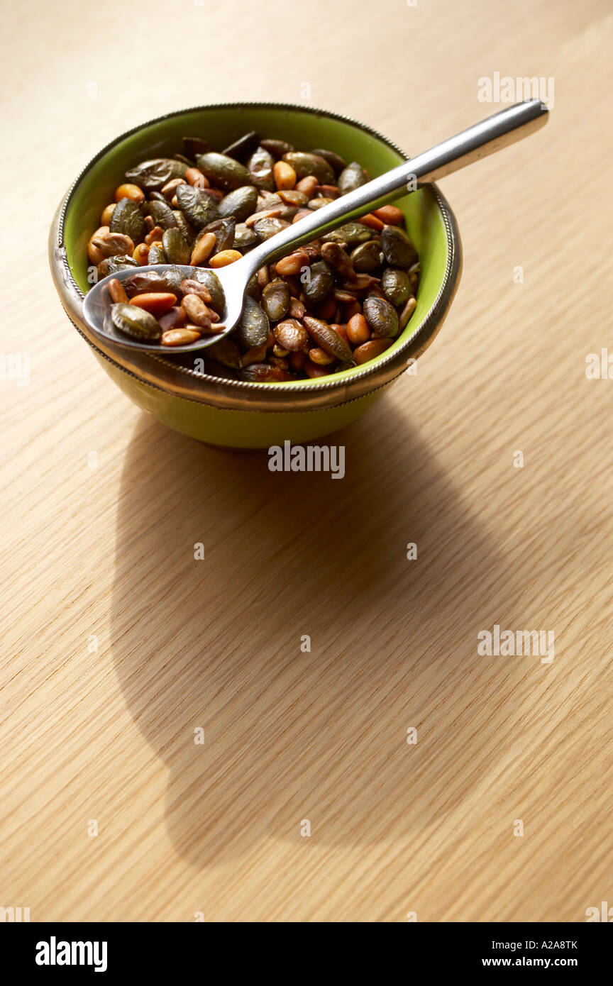 Roasted seeds in a dish Stock Photo - Alamy