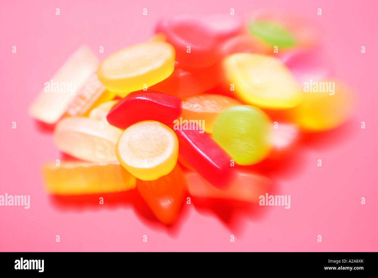 Sweets in different colours Stock Photo - Alamy