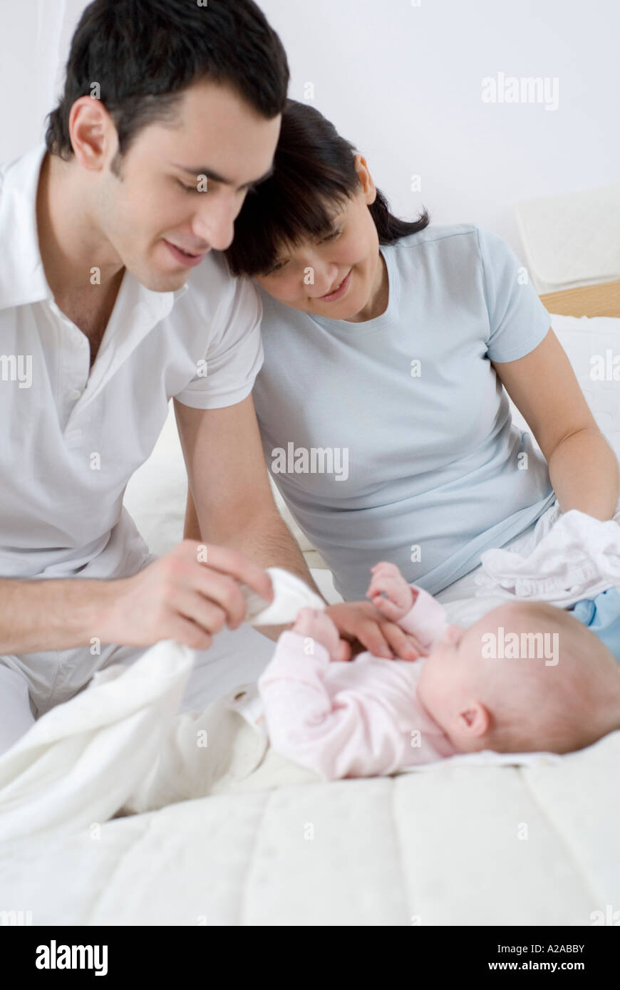 Man changing diaper vertical hi-res stock photography and images - Alamy