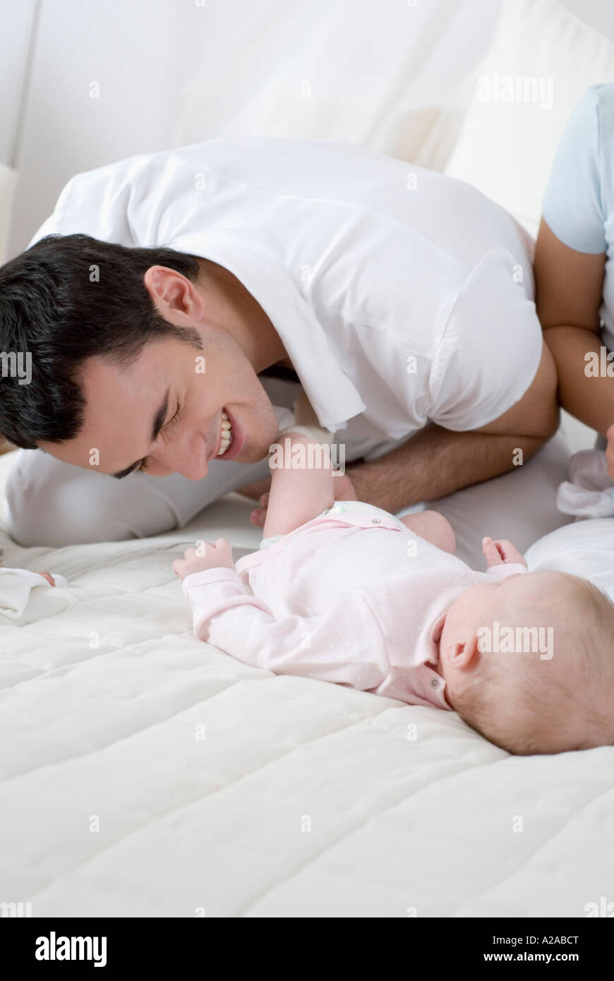 father playing with his baby Stock Photo - Alamy