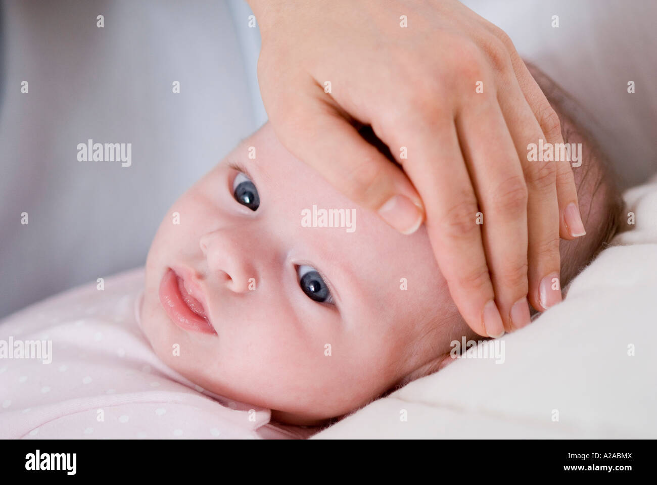 checking baby's temperature Stock Photo - Alamy