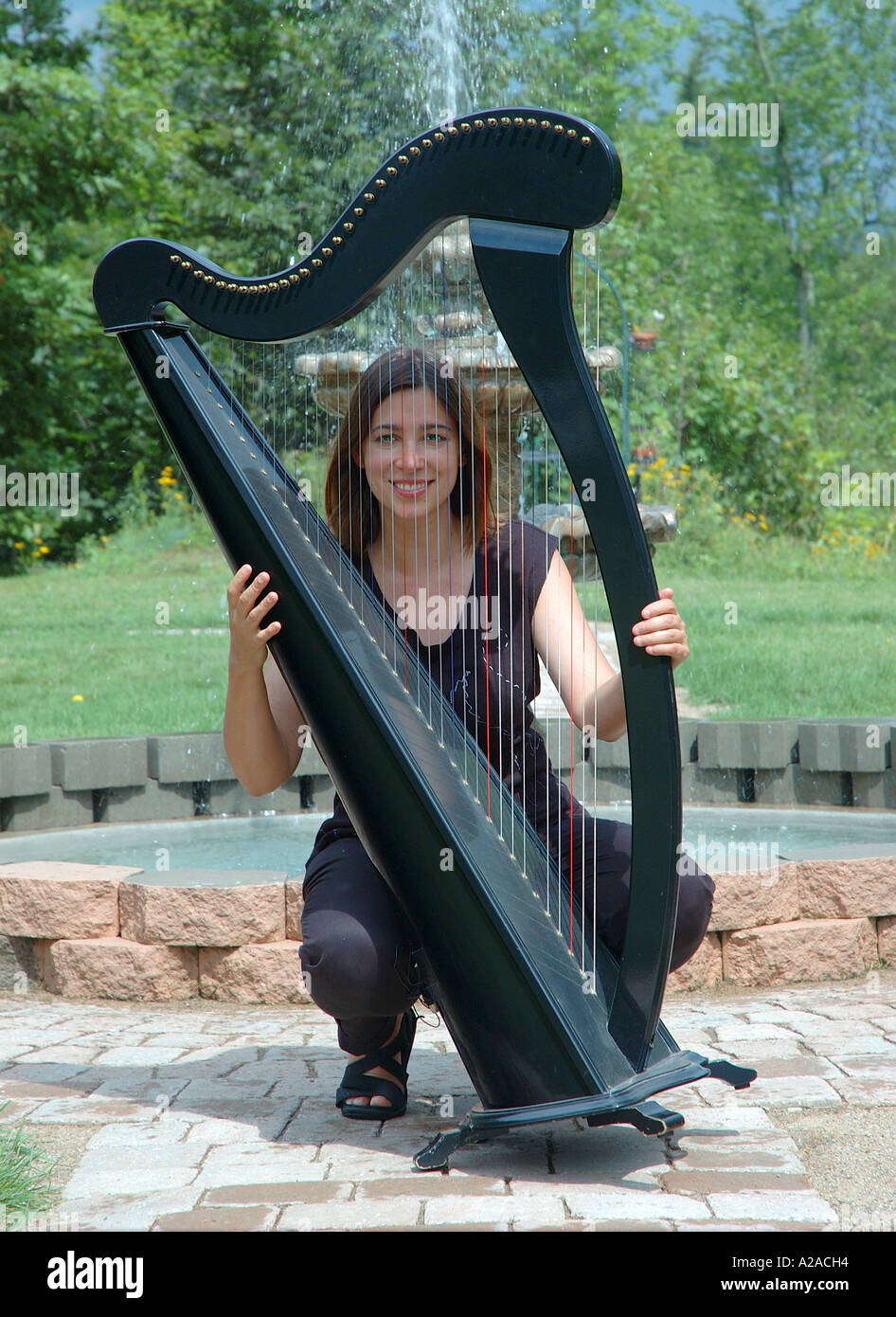 The young harpist hi-res stock photography and images - Alamy