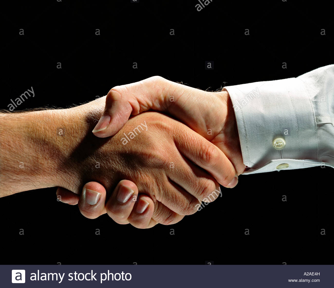 Golden Handshake Stock Photos & Golden Handshake Stock Images - Alamy