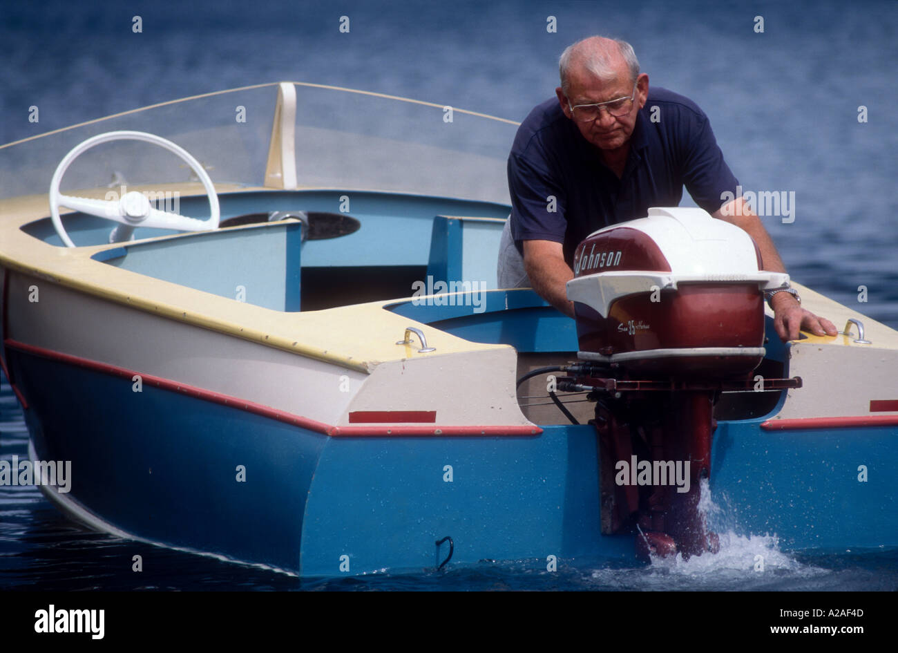 A 1950s runabout outboard motorboat Lake Rotoiti Nelson South Island ...