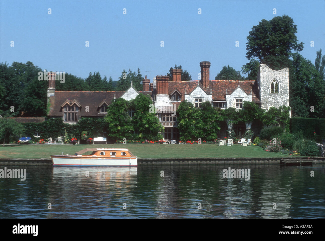 A 1958 Andrews built motor cruiser moored at Medmenham Abbey by the ...
