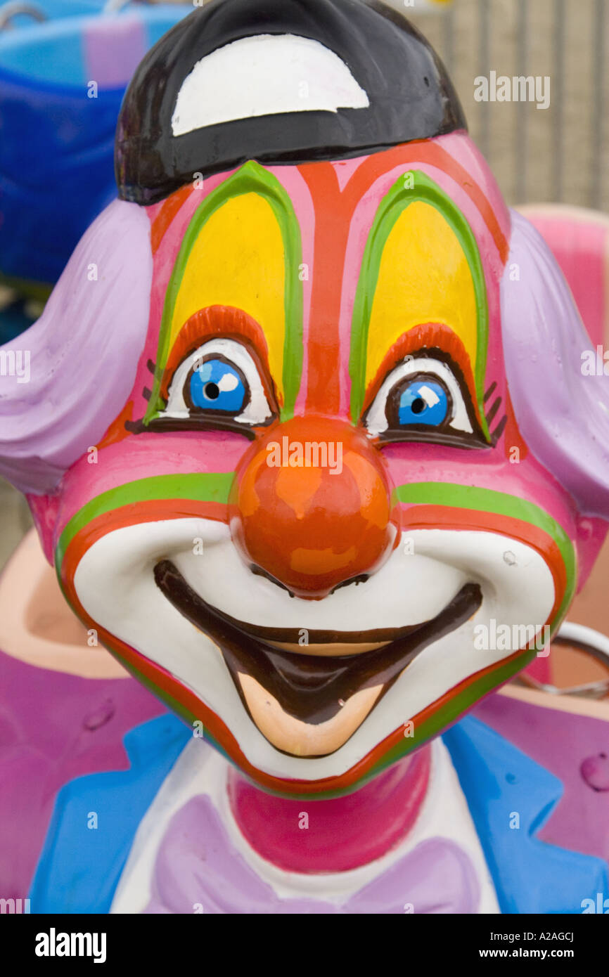 Colorfull clown face on carnival ride Stock Photo - Alamy