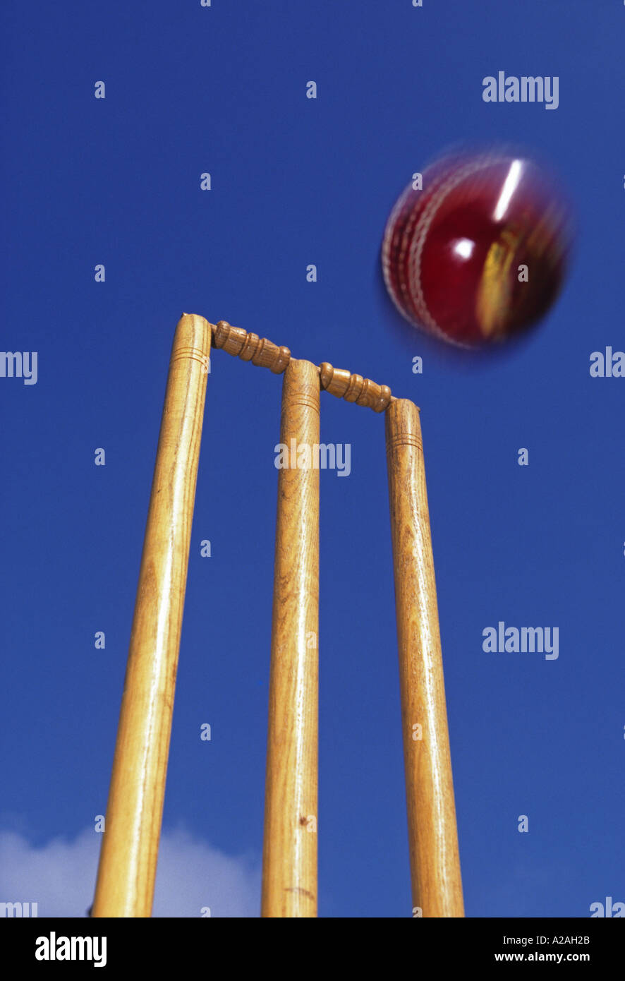 Red cricket ball stumps hi-res stock photography and images - Alamy