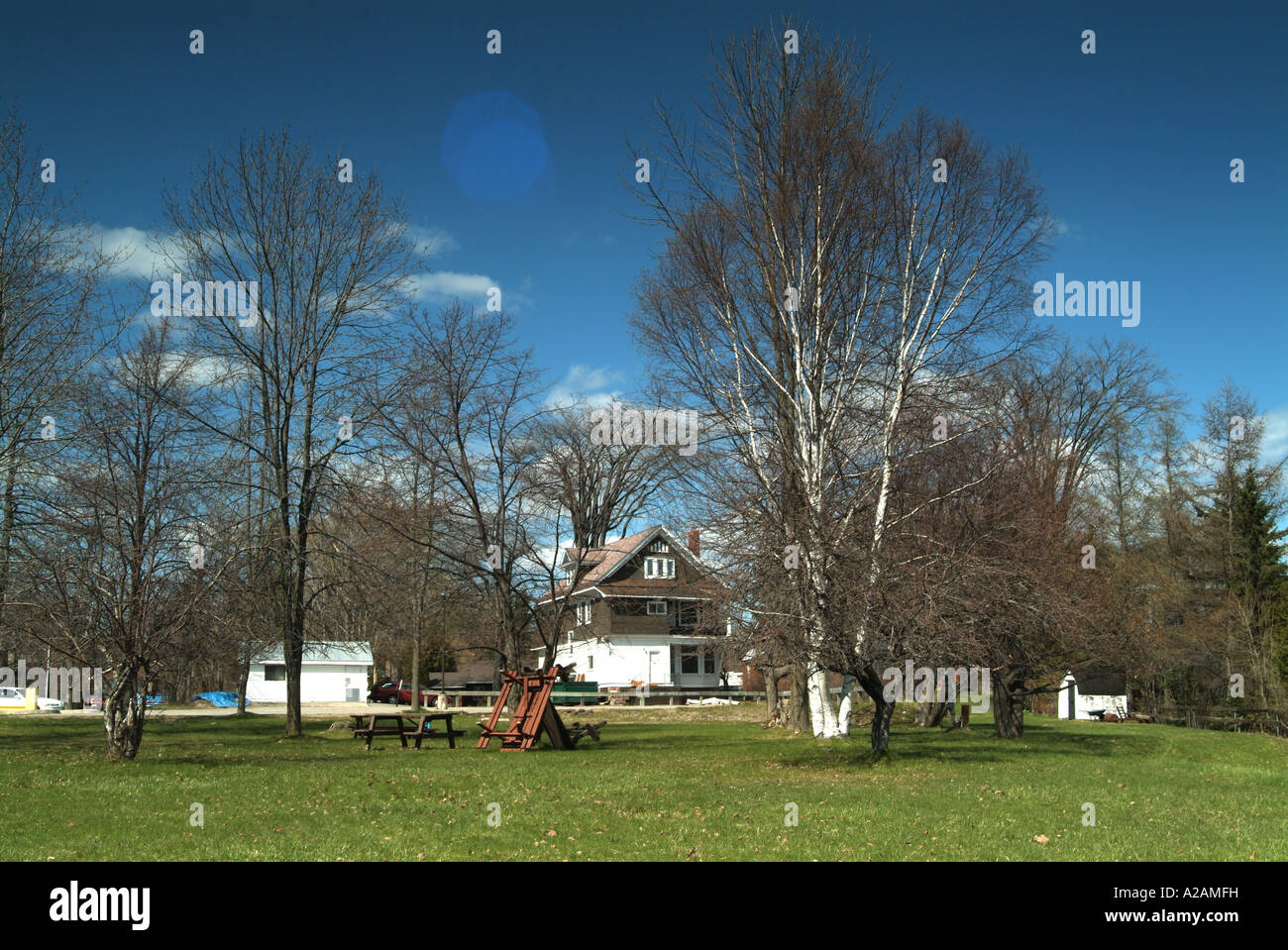 A house surround with trees Stock Photo - Alamy