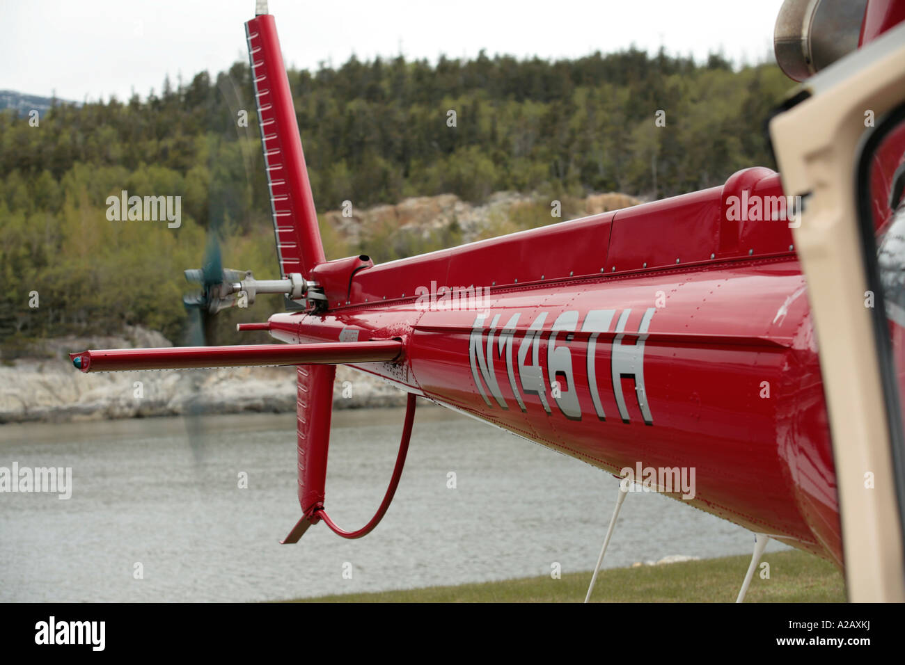 tail and spinning rotor of red helicopter Stock Photo - Alamy