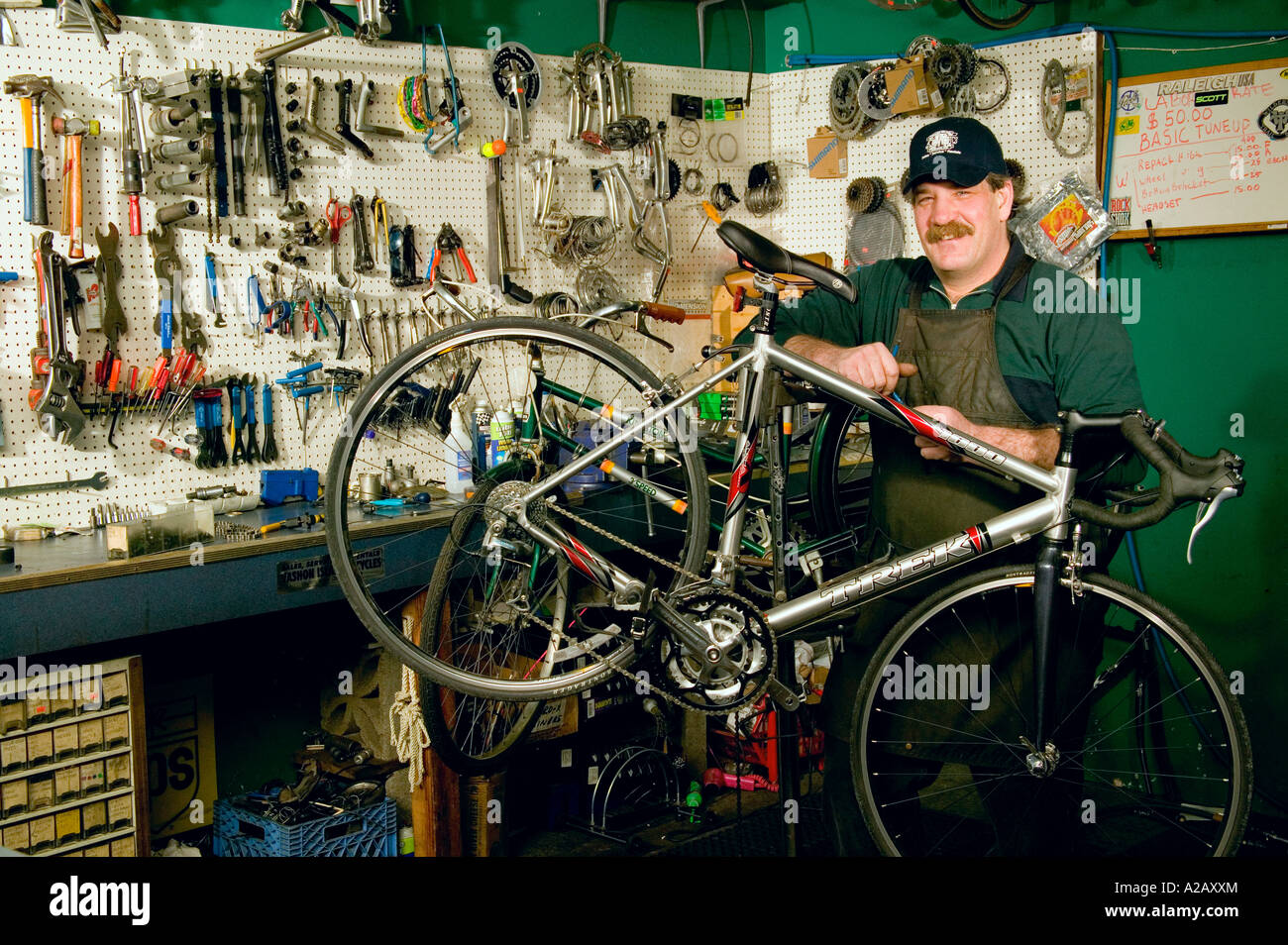 Bicycle repair Shop Stock Photo - Alamy