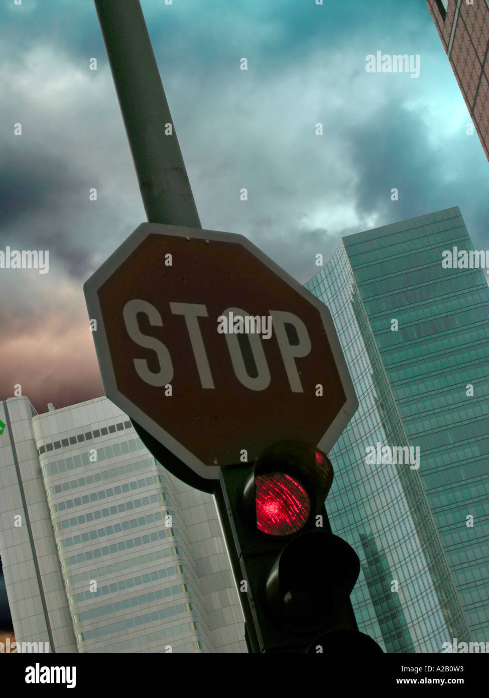 stop sign and red traffic light in front of bank building of Dresdner ...