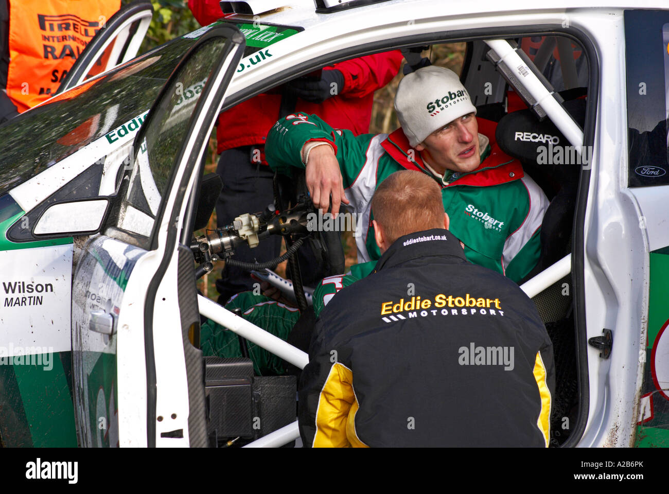 Motor Sport Competitor The driver of a motor sport rally car takes a ...