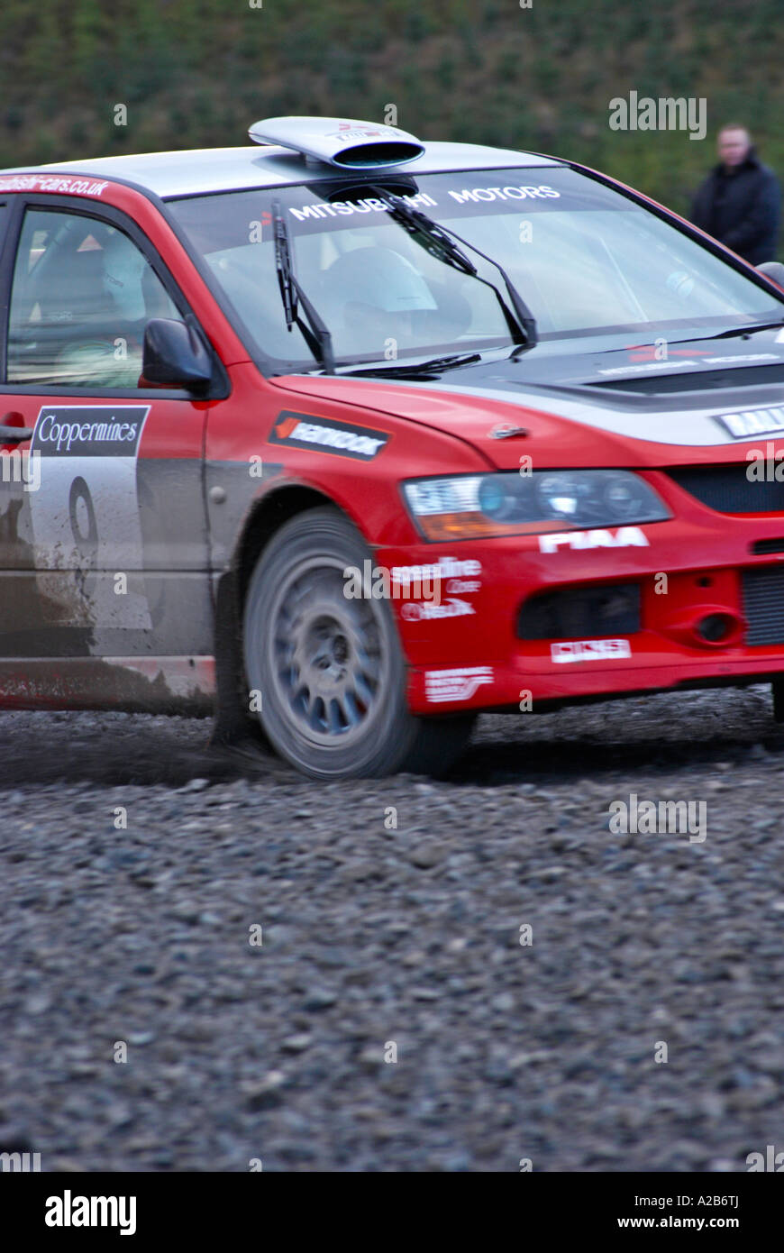 Rally Car Front vertical view of a competitors car that is sliding ...