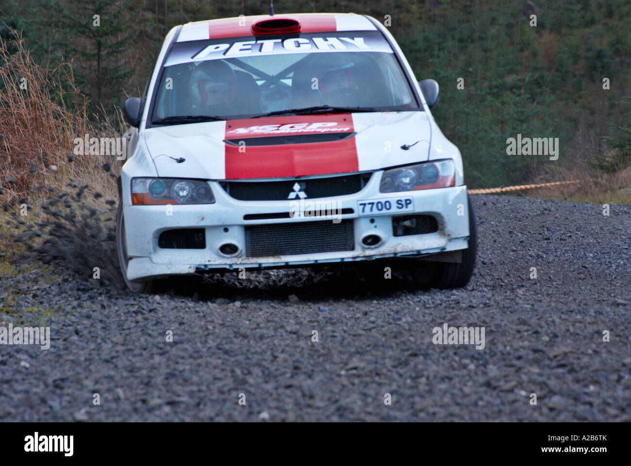 Rally Car Front horizontal view of a competitors car that is sliding ...