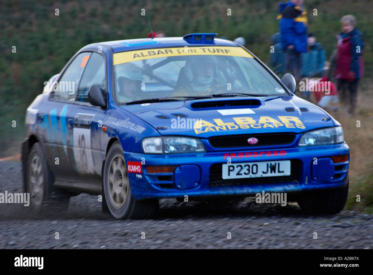 Rally Car Front horizontal view of a competitors car that is sliding ...