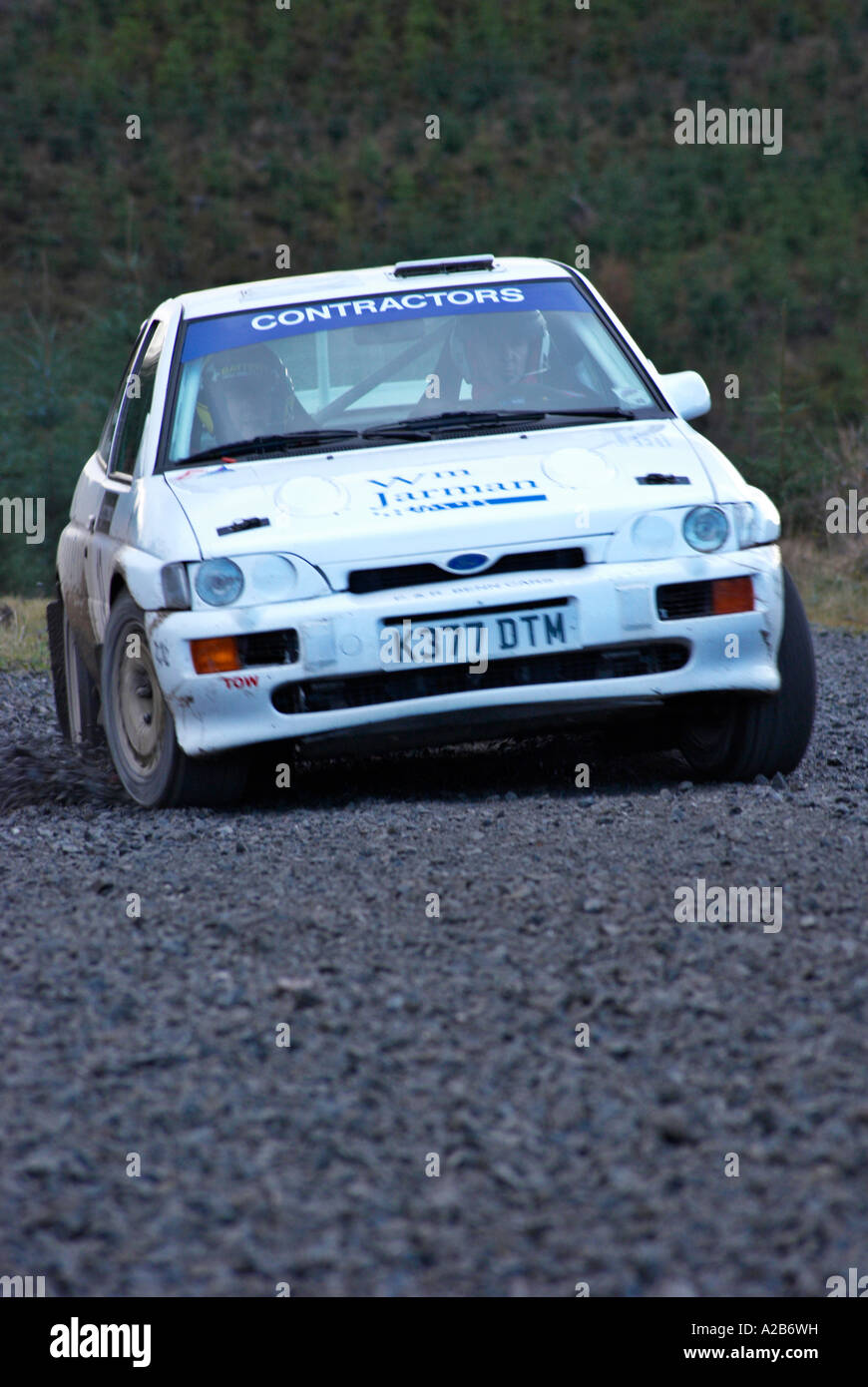 Rally Car Front vertical view of a competitors car that is sliding ...