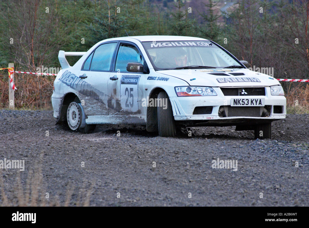 Rally Car Front horizontal view of a competitors car that is sliding ...