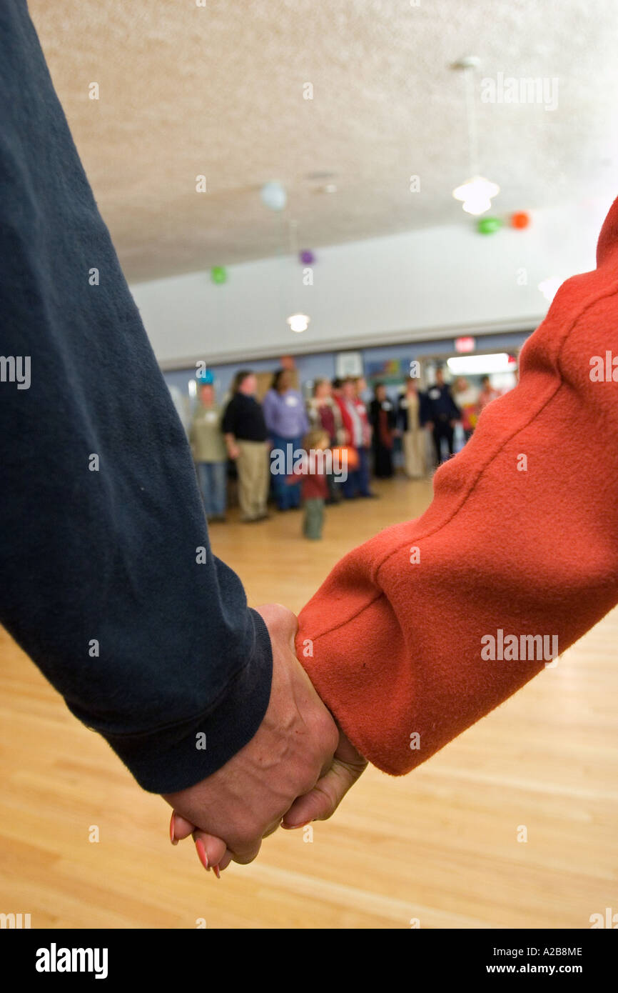 Ann Arbor Michigan Adults hold hands preparing to dance at a birthday ...