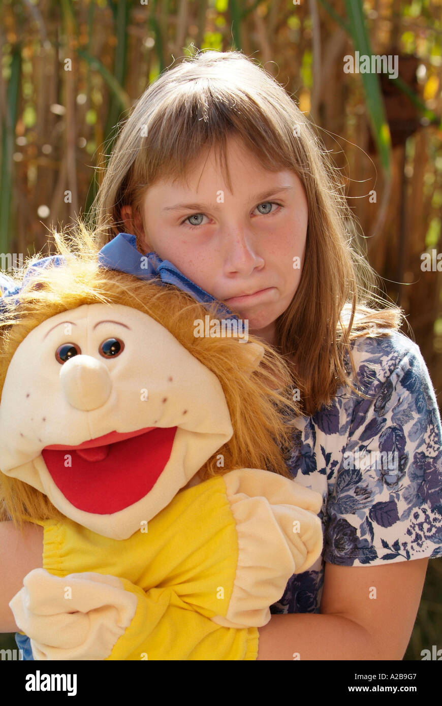 Girl with hand puppet Stock Photo - Alamy