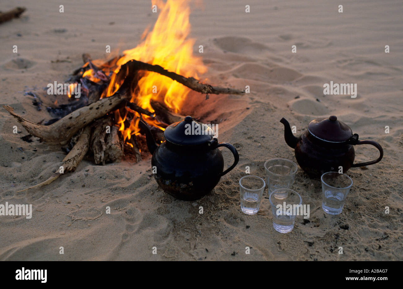 Arabian tea pot near campfire, Libya Stock Photo - Alamy