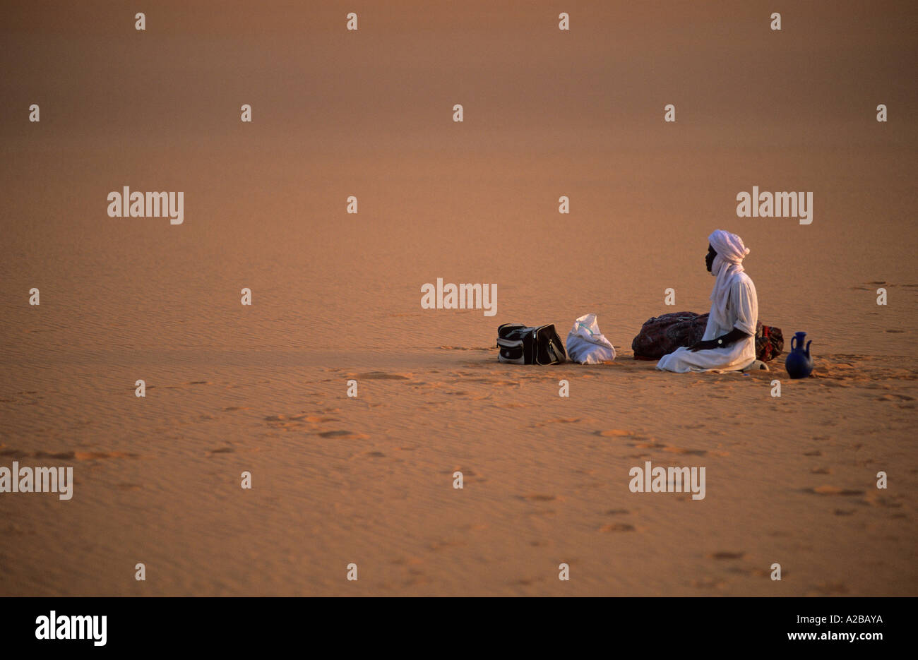 Muslim man praying in desert hi-res stock photography and images - Alamy