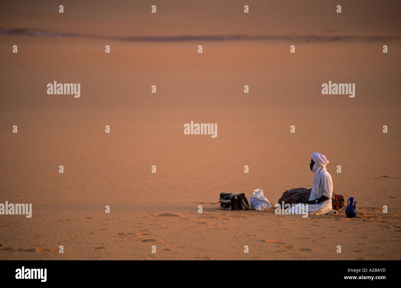 Muslim man praying in desert hi-res stock photography and images - Alamy