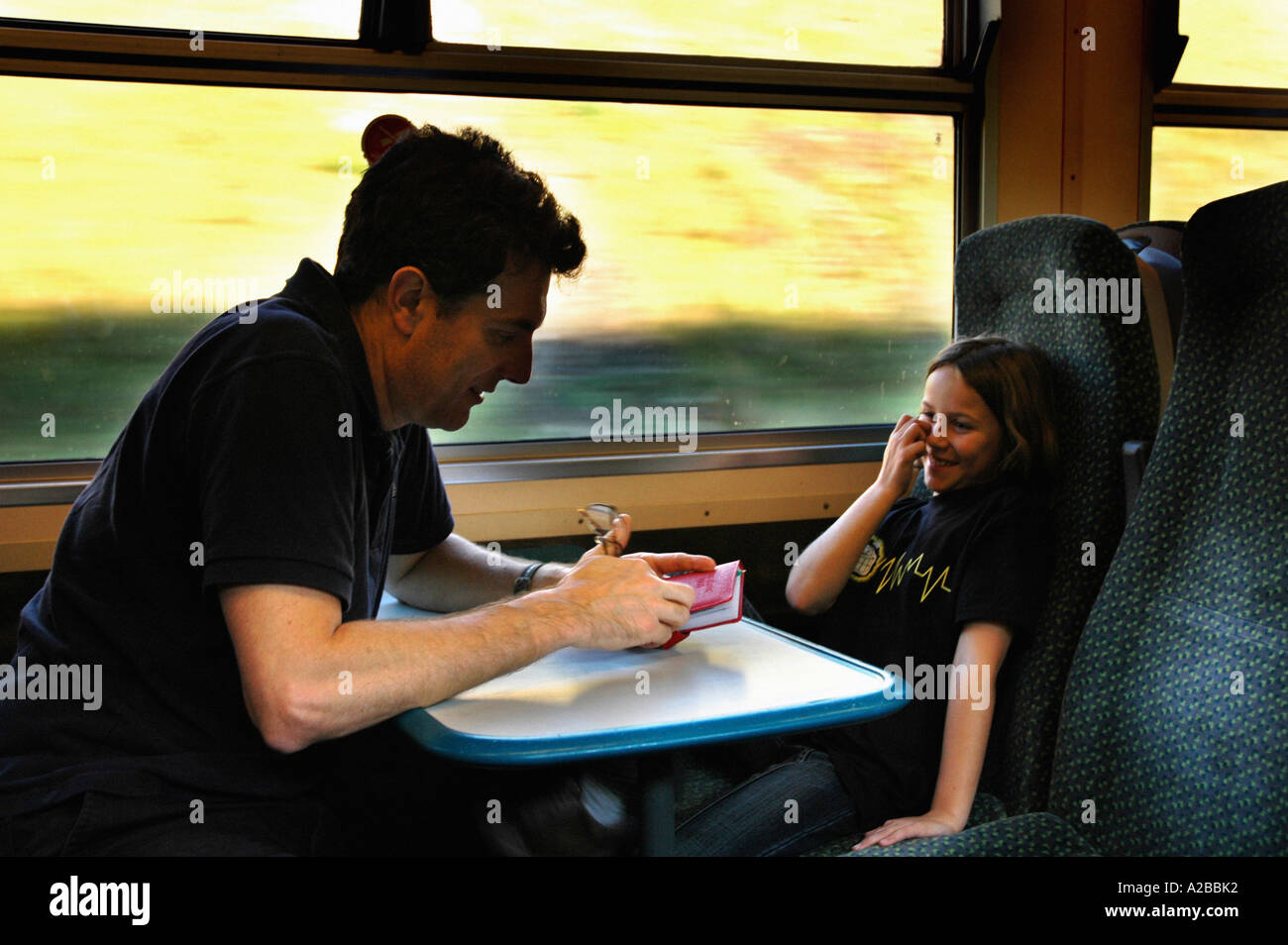 Father and daughter on the train hi-res stock photography and images ...