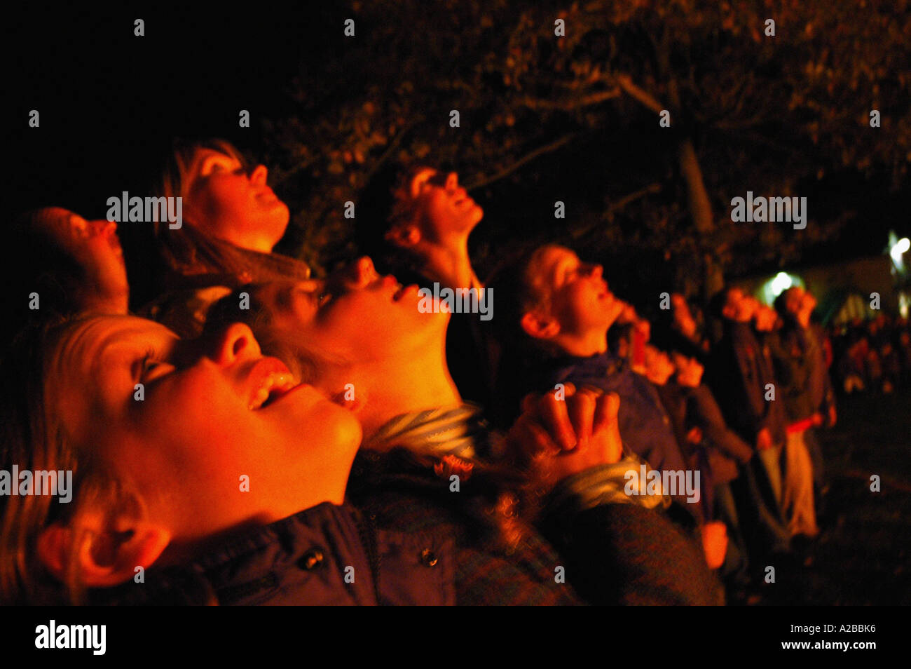 crowd looking up at the fireworks on bonfire night Stock Photo - Alamy
