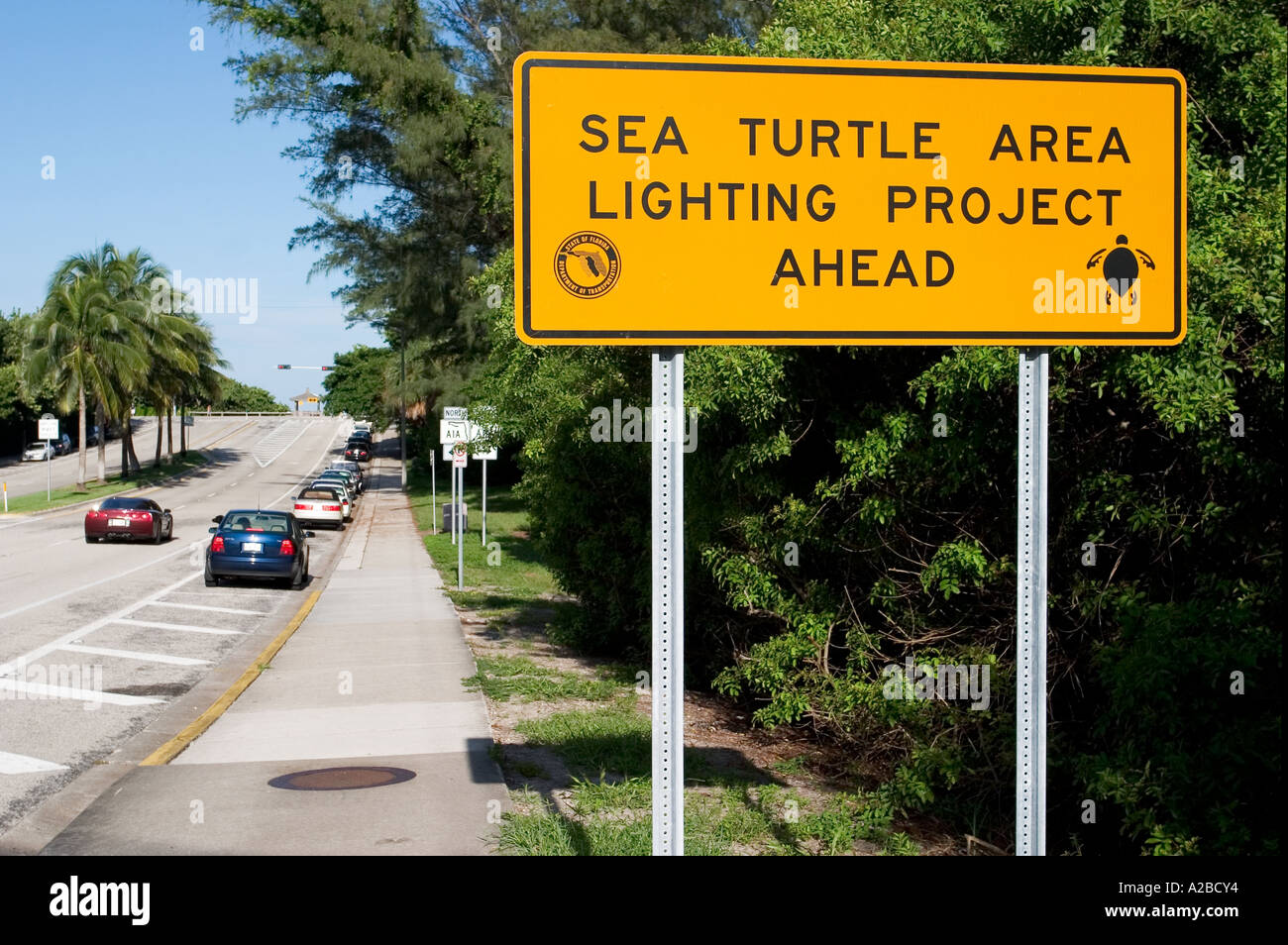 Roadway sign in Florida, USA indicating sea turtle friendly lighting ...
