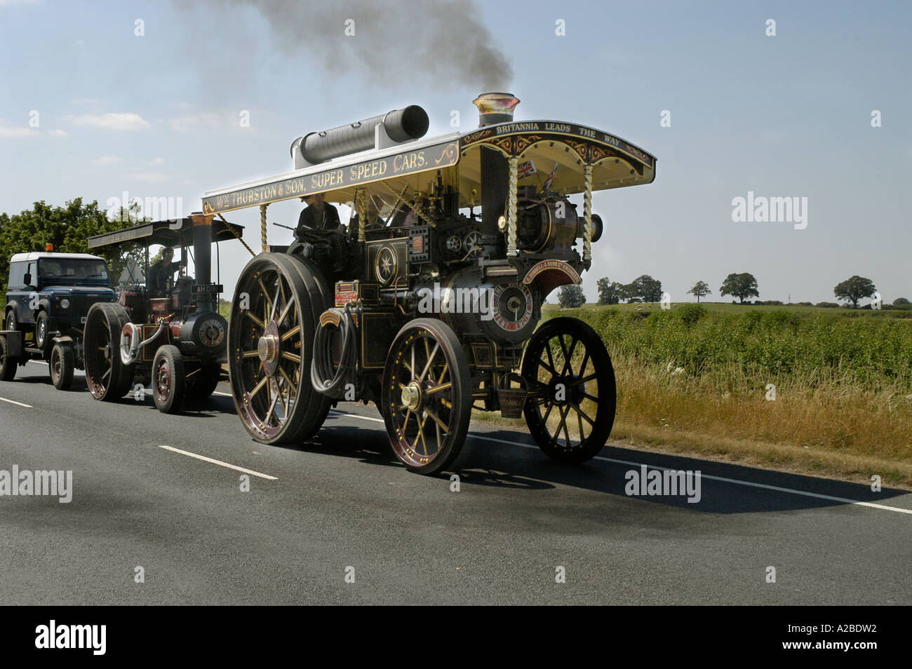 Fun Fair steam engine pulling another steam engine and trailer on the ...