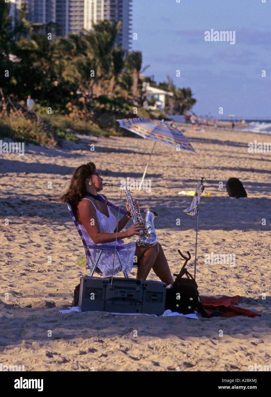 Young woman playing sax on hi-res stock photography and images - Alamy
