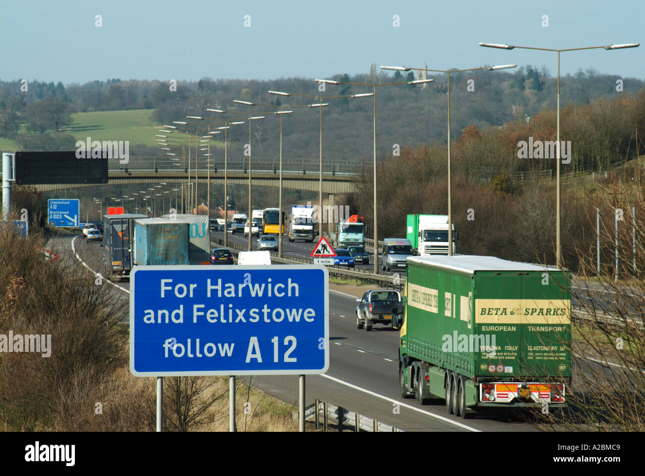 M25 motorway traffic sign advising route for A12 Stock Photo - Alamy