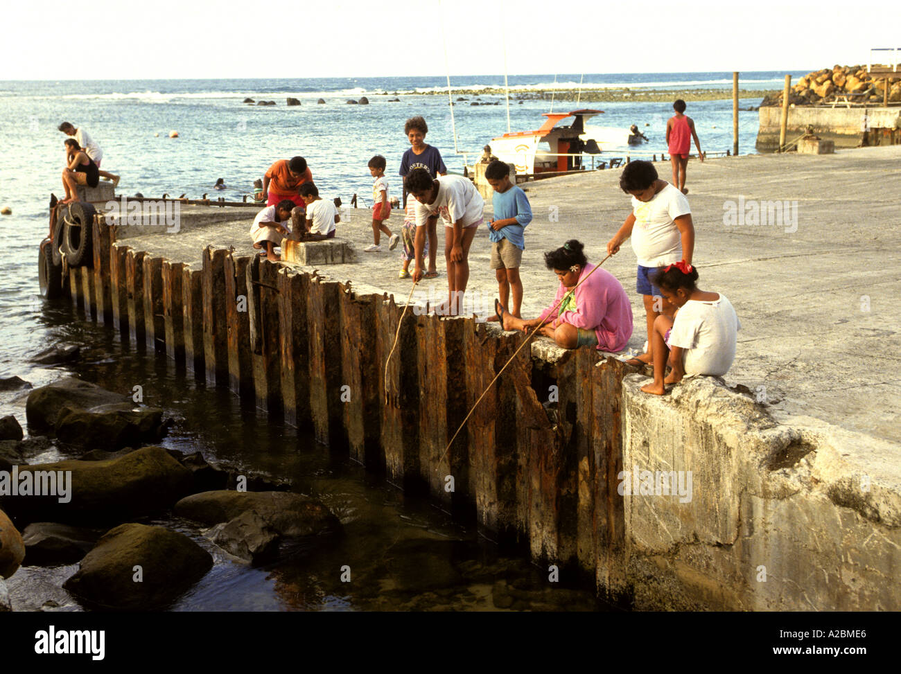 CHILDREN AT PLAY ON RAROTONGA COOK ISLANDS Stock Photo - Alamy