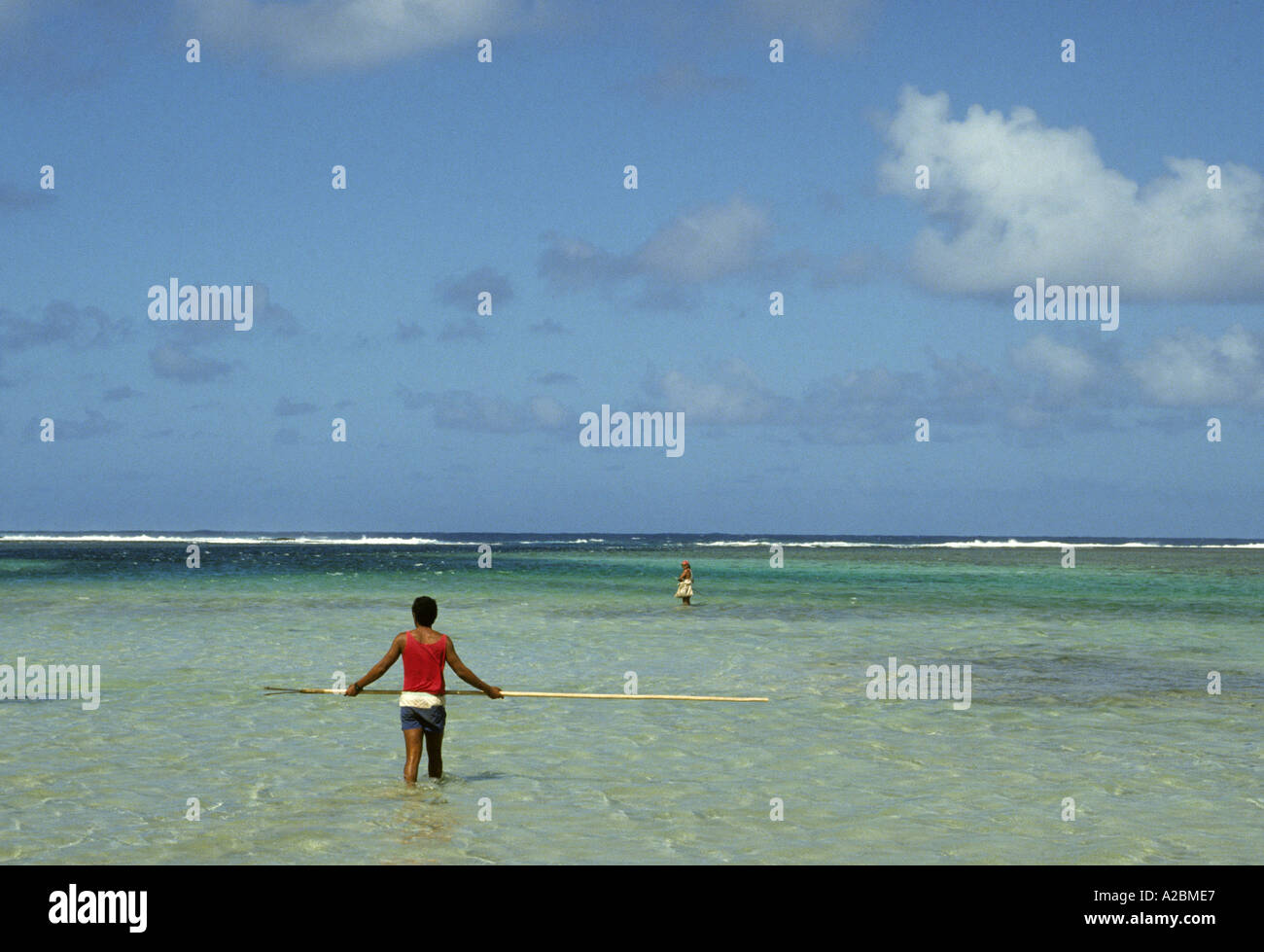 LAGOON SPEAR FISHING ON RAROTONGA COOK ISLANDS Stock Photo - Alamy