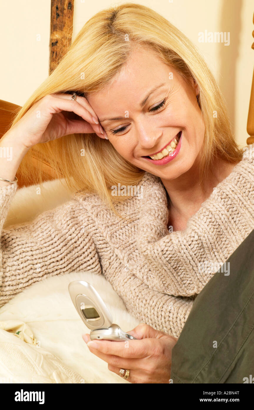 Woman with moble phone hi-res stock photography and images - Alamy