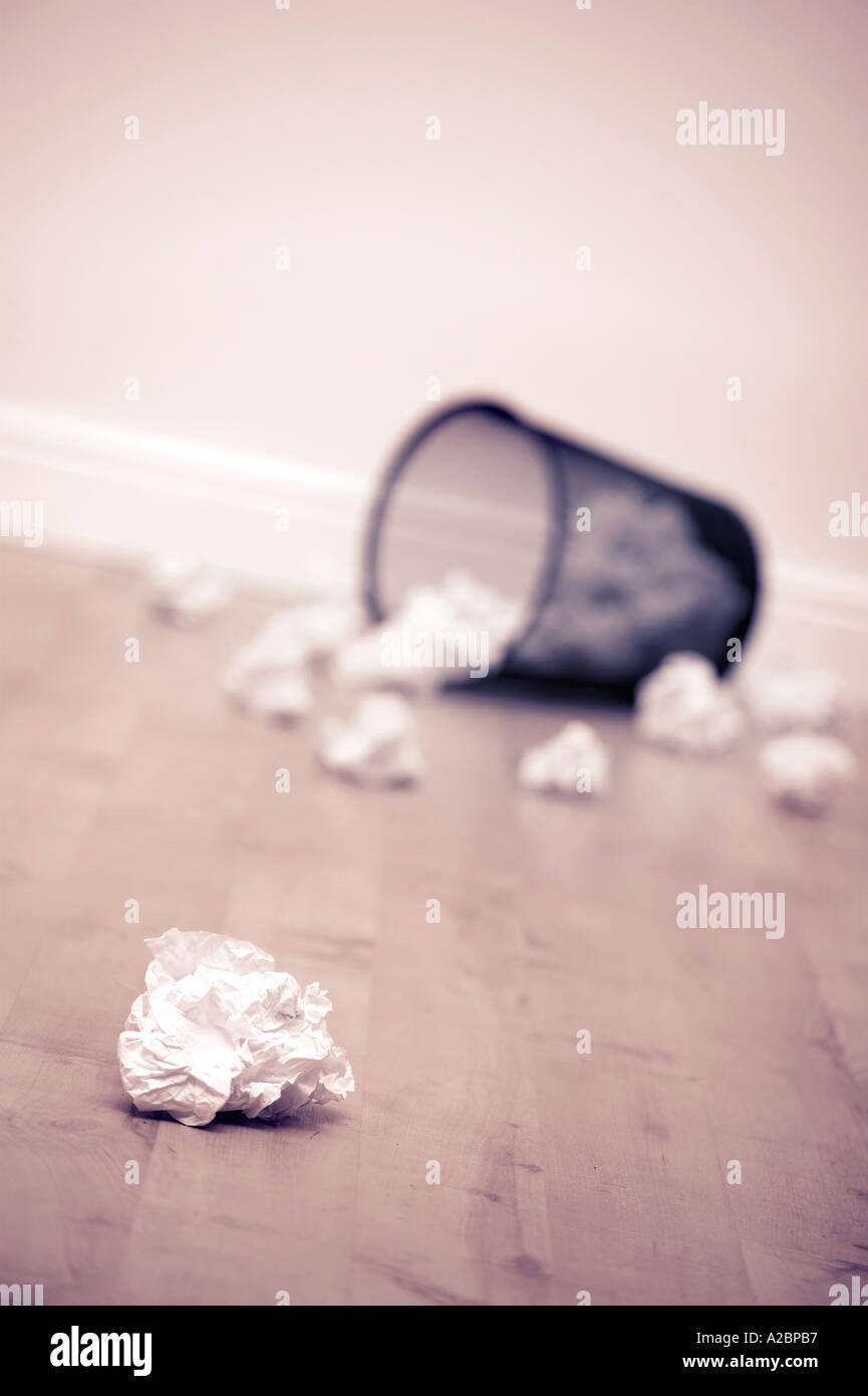 LITTER BIN AND CRUMPLED WASTE PAPER ON WOOD FLOOR Stock Photo - Alamy