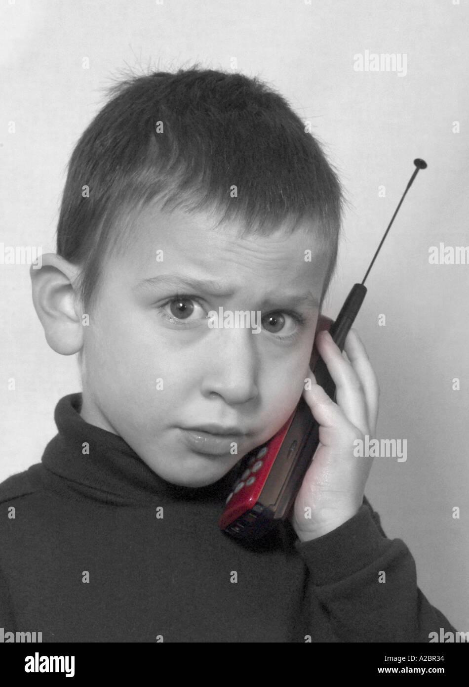 boy using a cell phone Stock Photo - Alamy