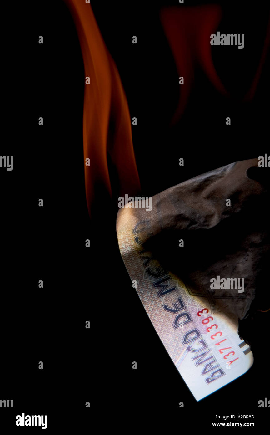 Mexican peso note in fire with visible flame Stock Photo - Alamy