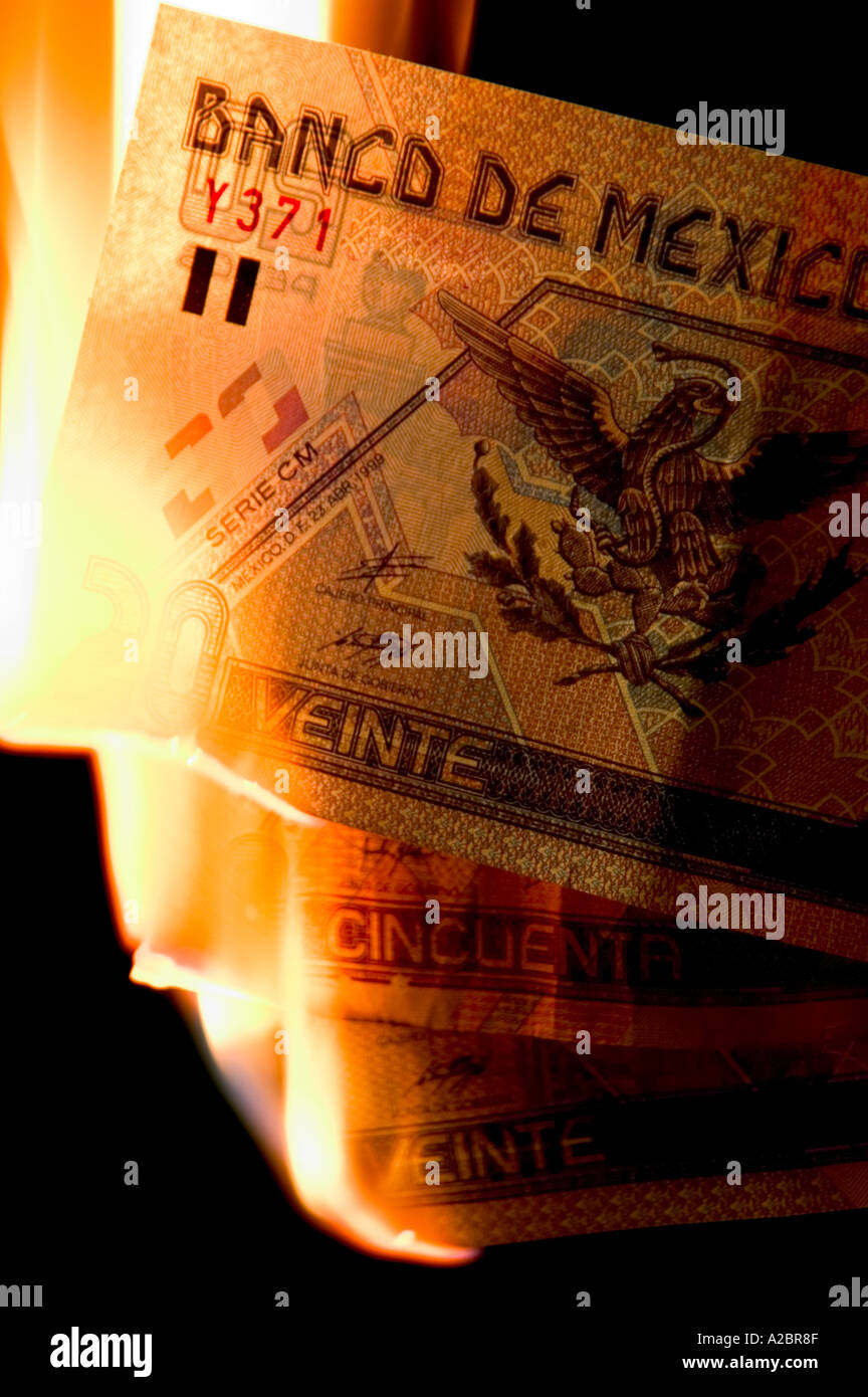 Mexican peso note burning with visible flame Stock Photo - Alamy